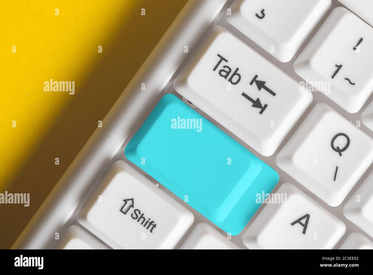 Different Colored Keyboard key With Accessories Arranged On Empty copy ...