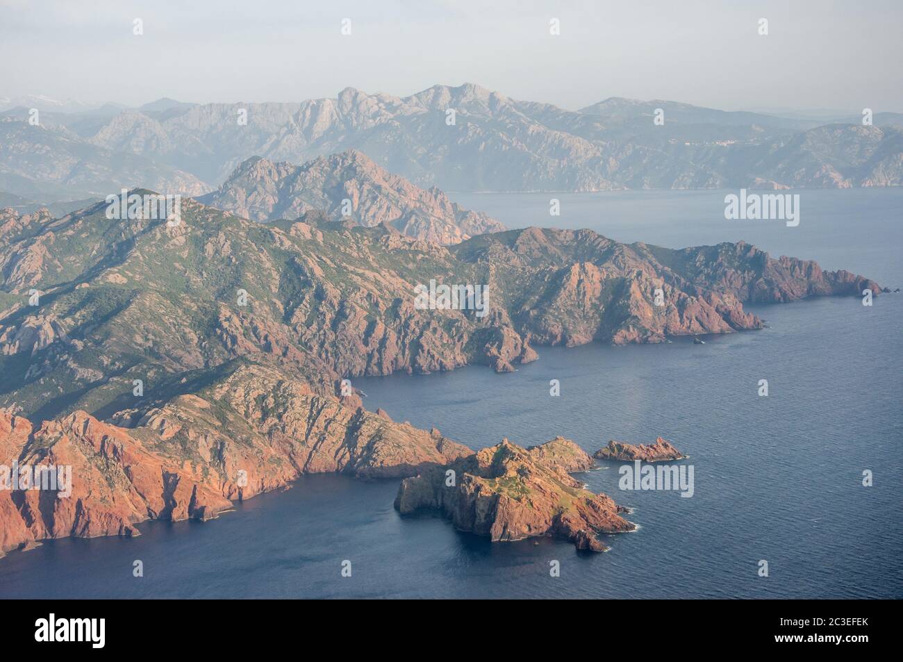 flight over Corsica in spring. Calvi and the creeks of Piana in sight ...