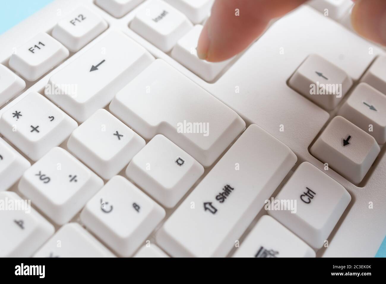 Pc keyboard key with pointing finger above background copy space Stock ...