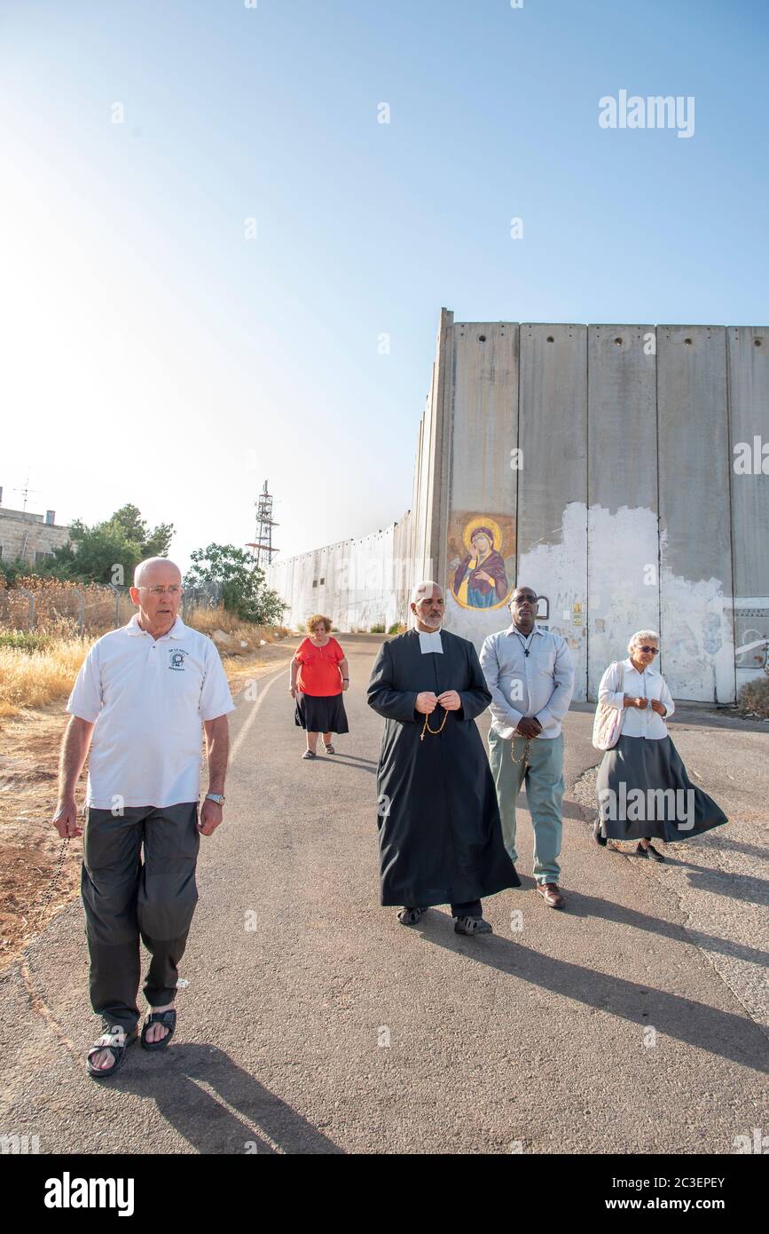 Brother Peter Bray with Mrs Clemence Handal- lives near the wall and ...