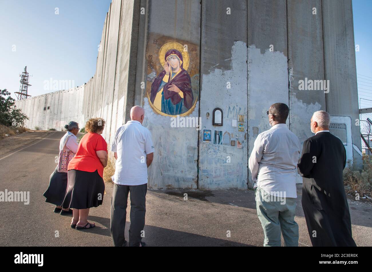 Brother Peter Bray with Mrs Clemence Handal- lives near the wall and ...
