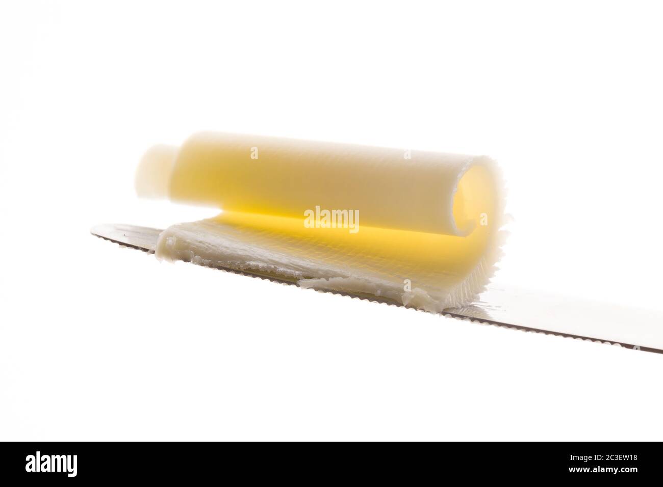 Butter Curl Freshly rolled-up butter swirl Stock Photo - Alamy