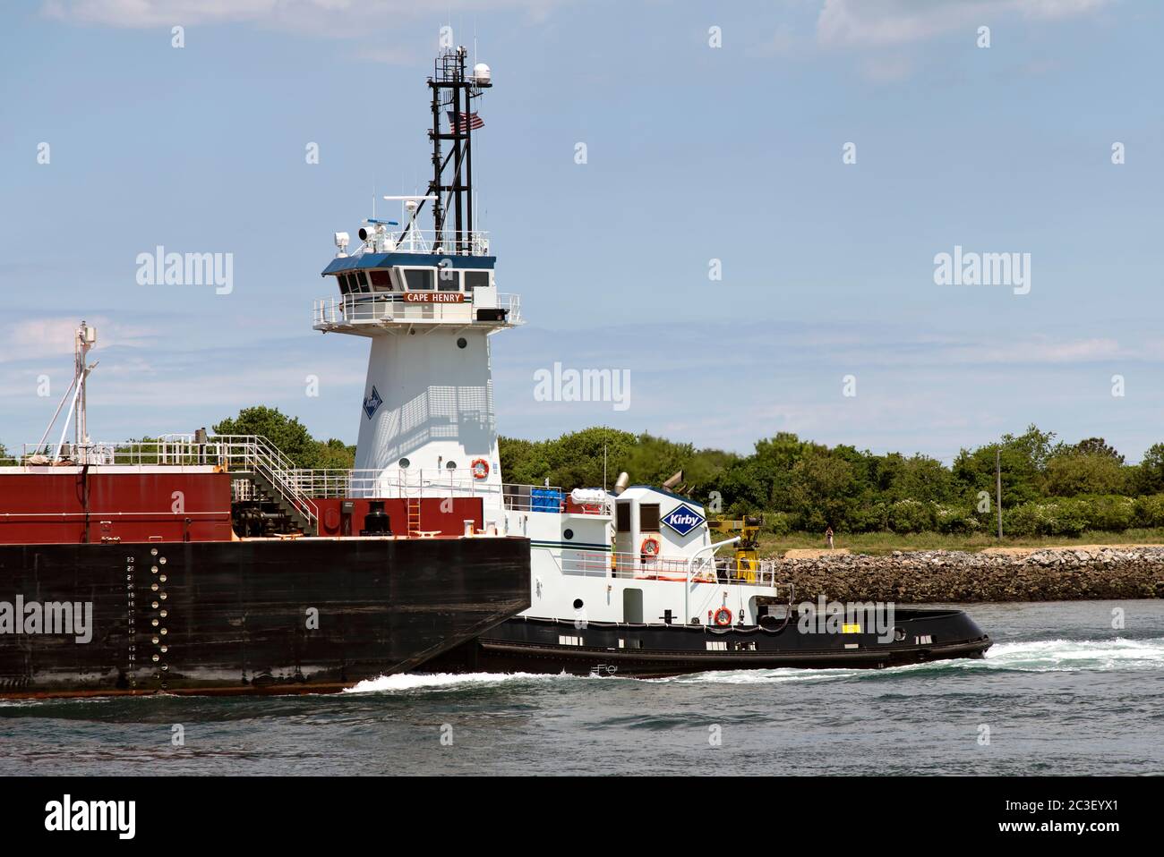 Detail of a container barge and tug underway in the Cape Cod Canal, in ...