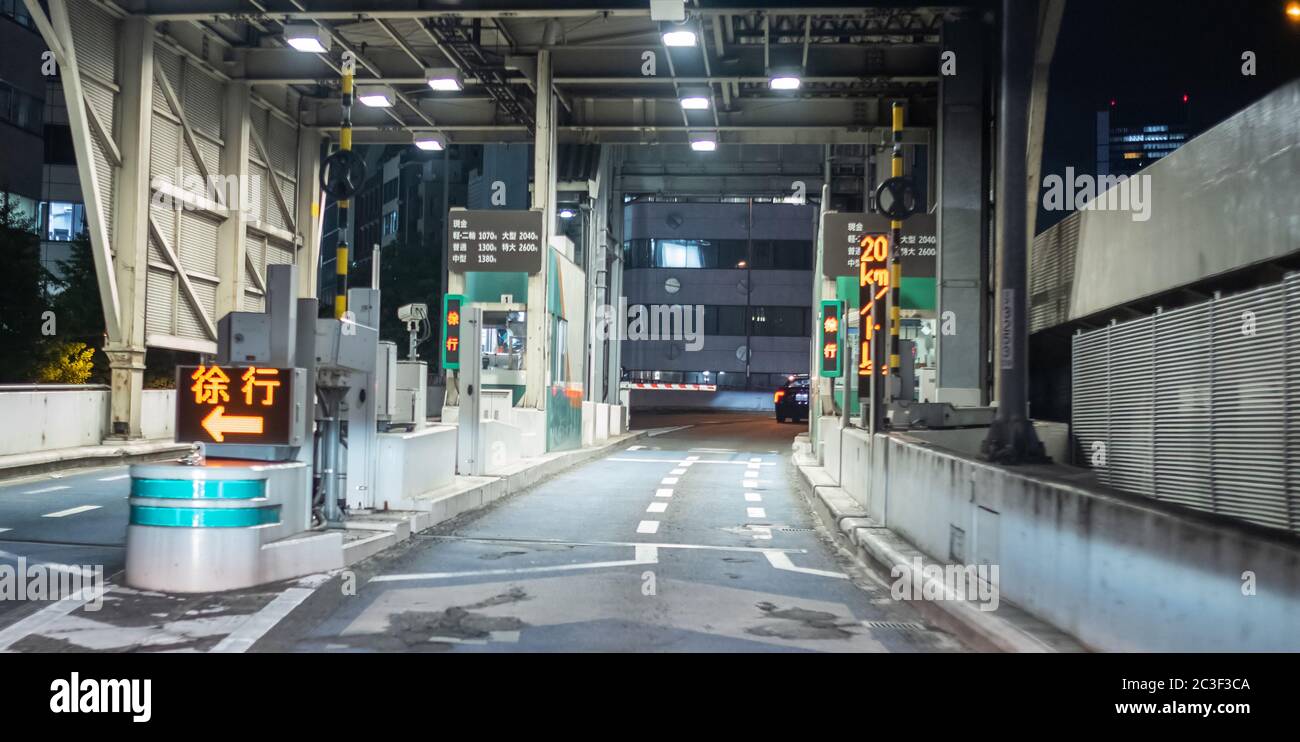 Toll booth at Tokyo city highway at night, Japan Stock Photo - Alamy