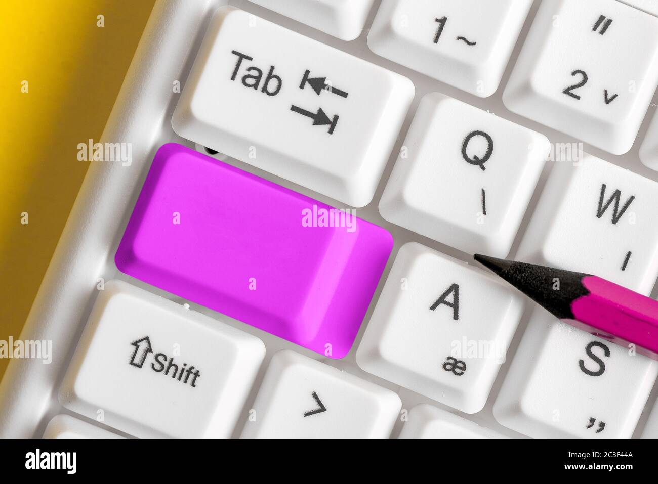 Different Colored Keyboard key With Accessories Arranged On Empty copy ...