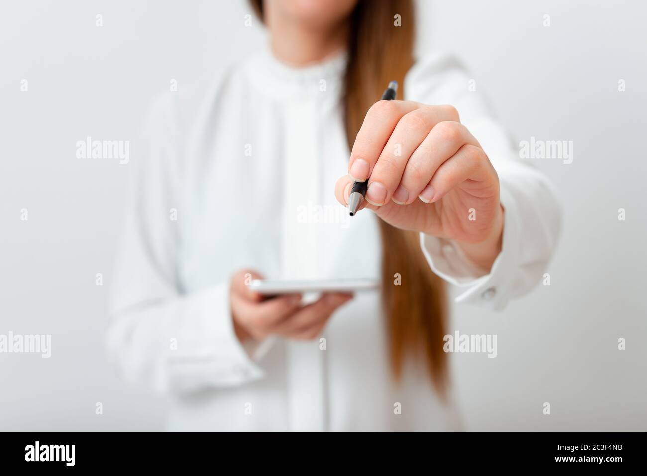 Model Displaying Different Shots of Holding Pen Ready For Promotional ...