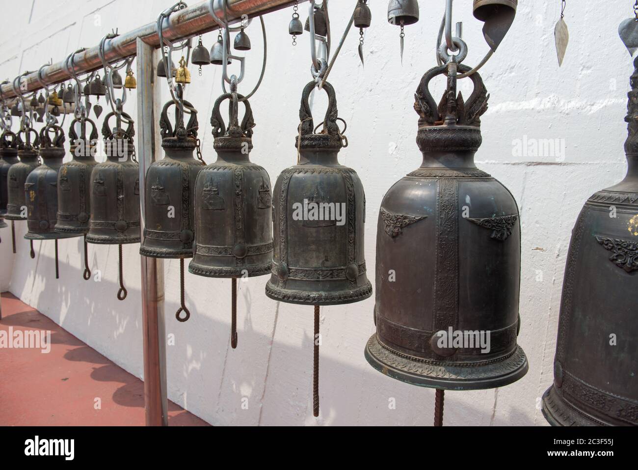 Brass temple bells in temple hi-res stock photography and images - Alamy