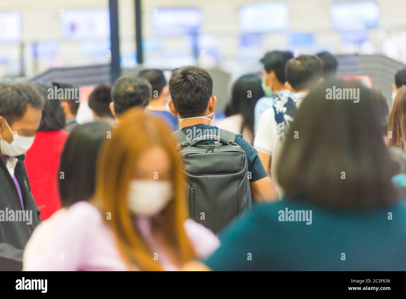 Crowd of people waiting in airport Stock Photo - Alamy