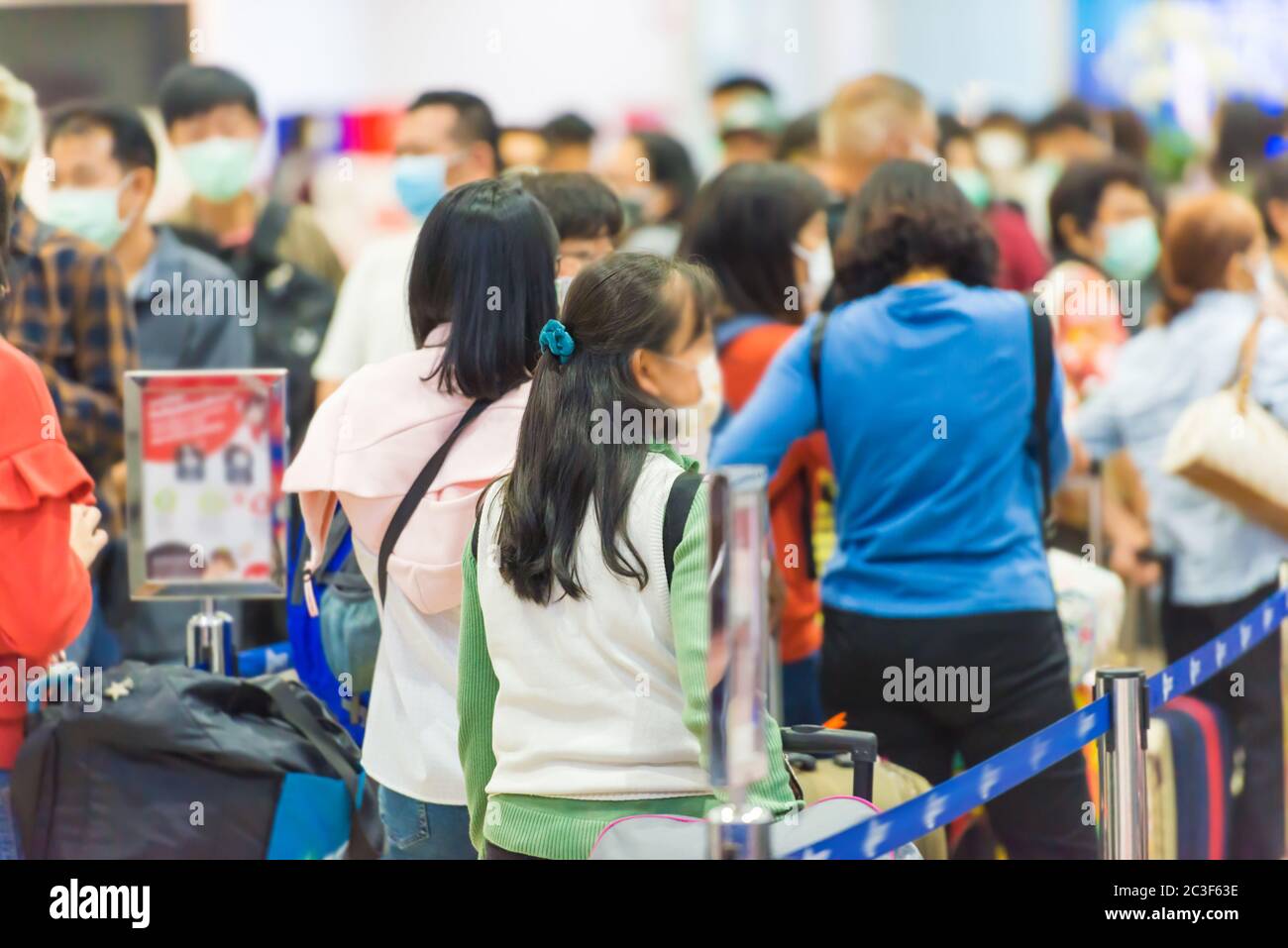 Crowd of people waiting in airport Stock Photo - Alamy