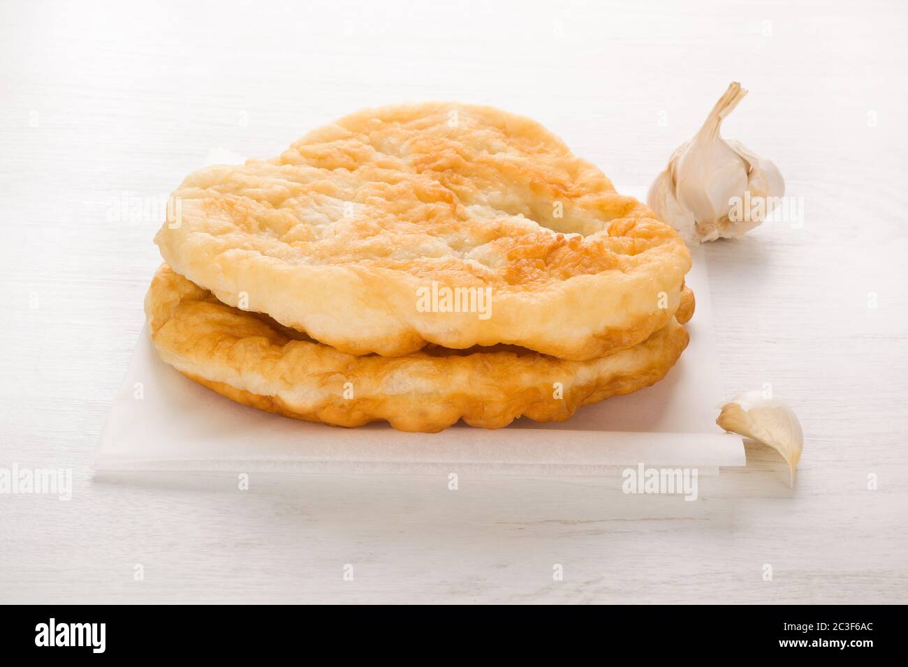 Deep fried langos speciality Stock Photo - Alamy