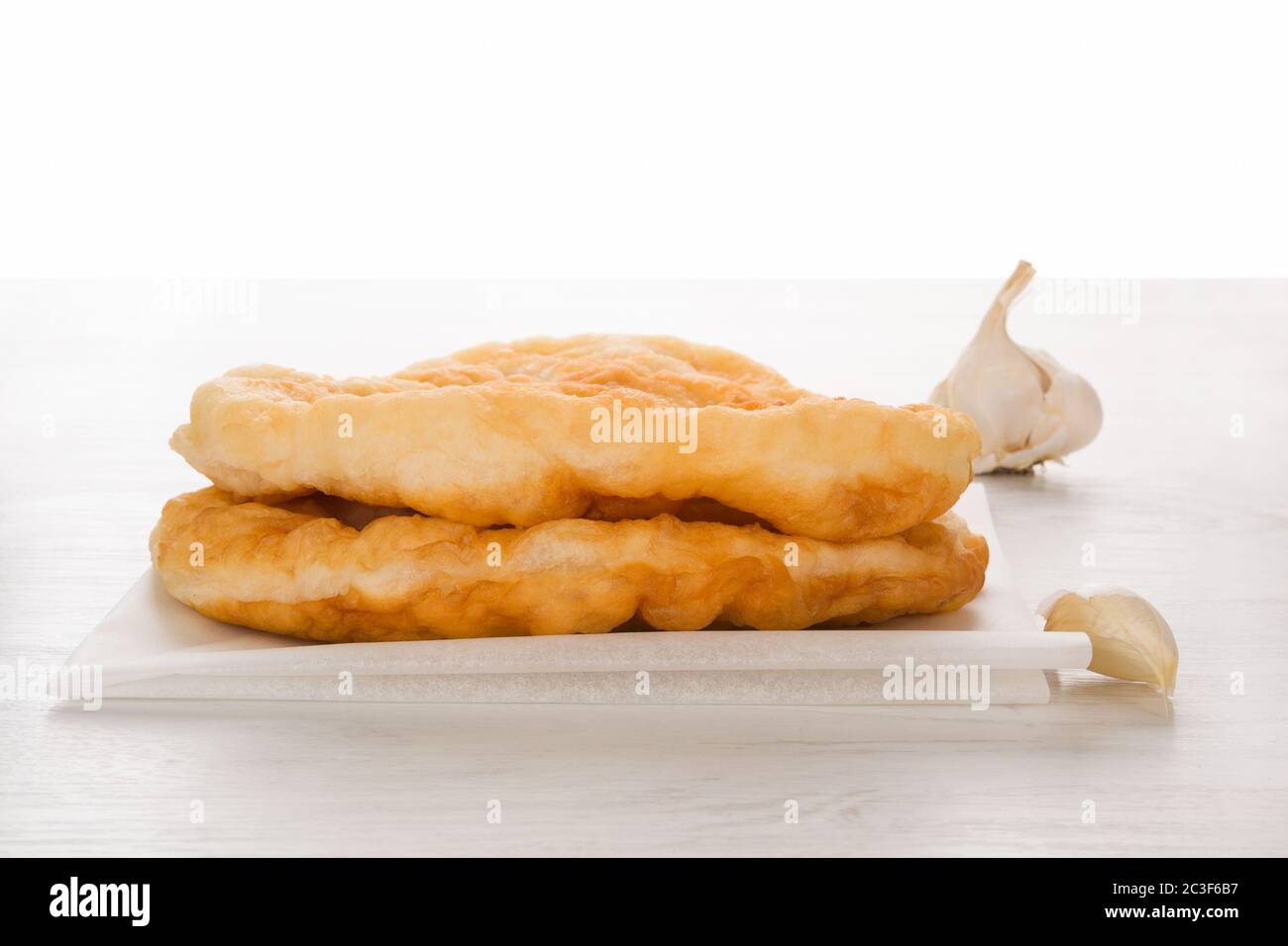 Deep fried langos speciality Stock Photo - Alamy