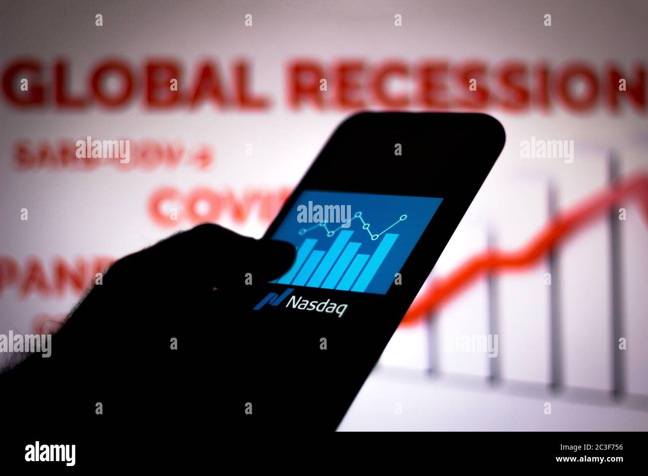 In this photo illustration a Nasdaq Composite logo seen displayed on a ...
