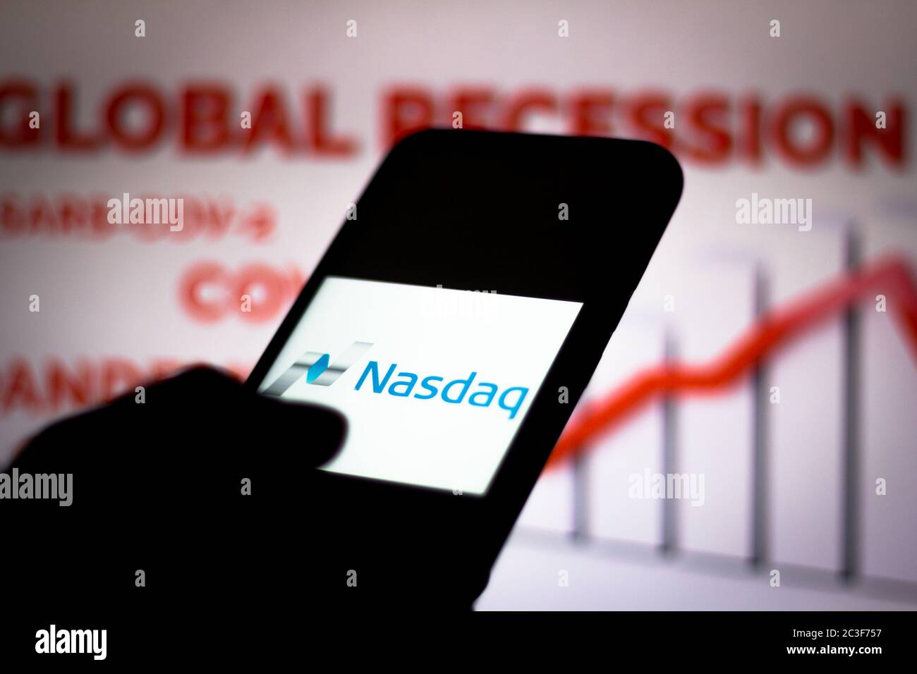 In this photo illustration a Nasdaq Composite logo seen displayed on a ...