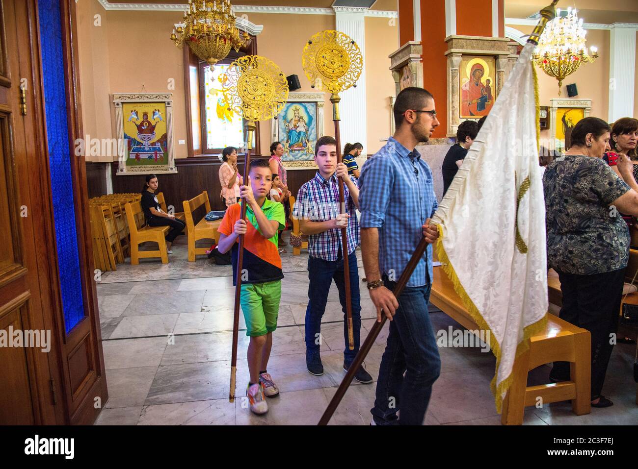 The Rev. Androwas Bahus leads an early morning liturgy at St. Peter and ...