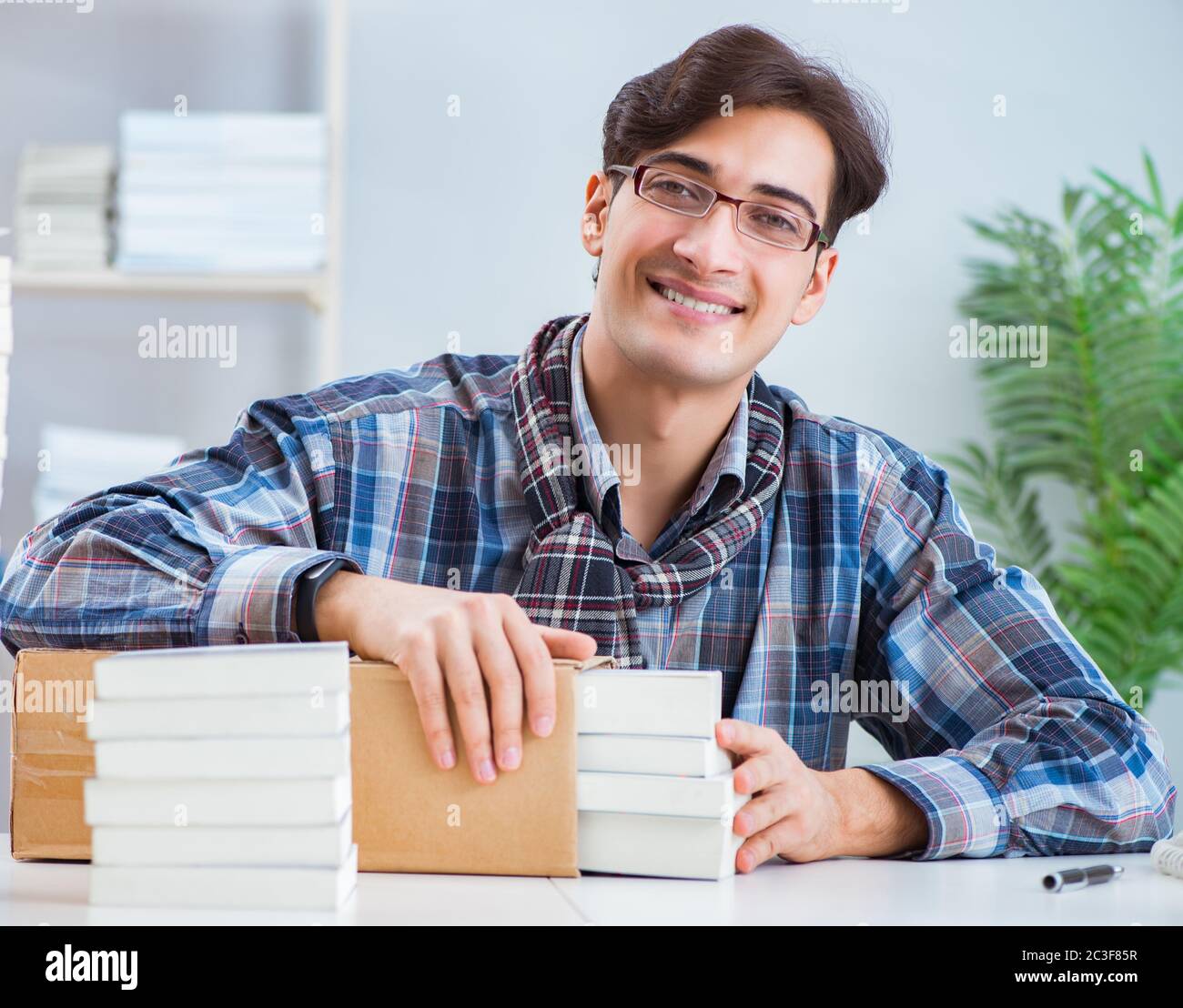 Writer presenting his books to public Stock Photo - Alamy