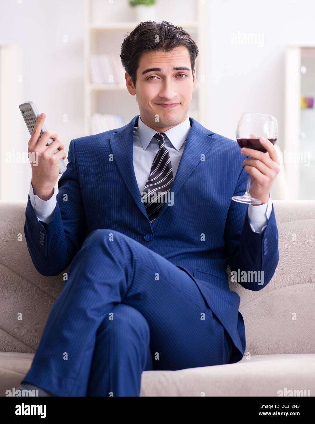 Changing channels businessman hi-res stock photography and images - Alamy