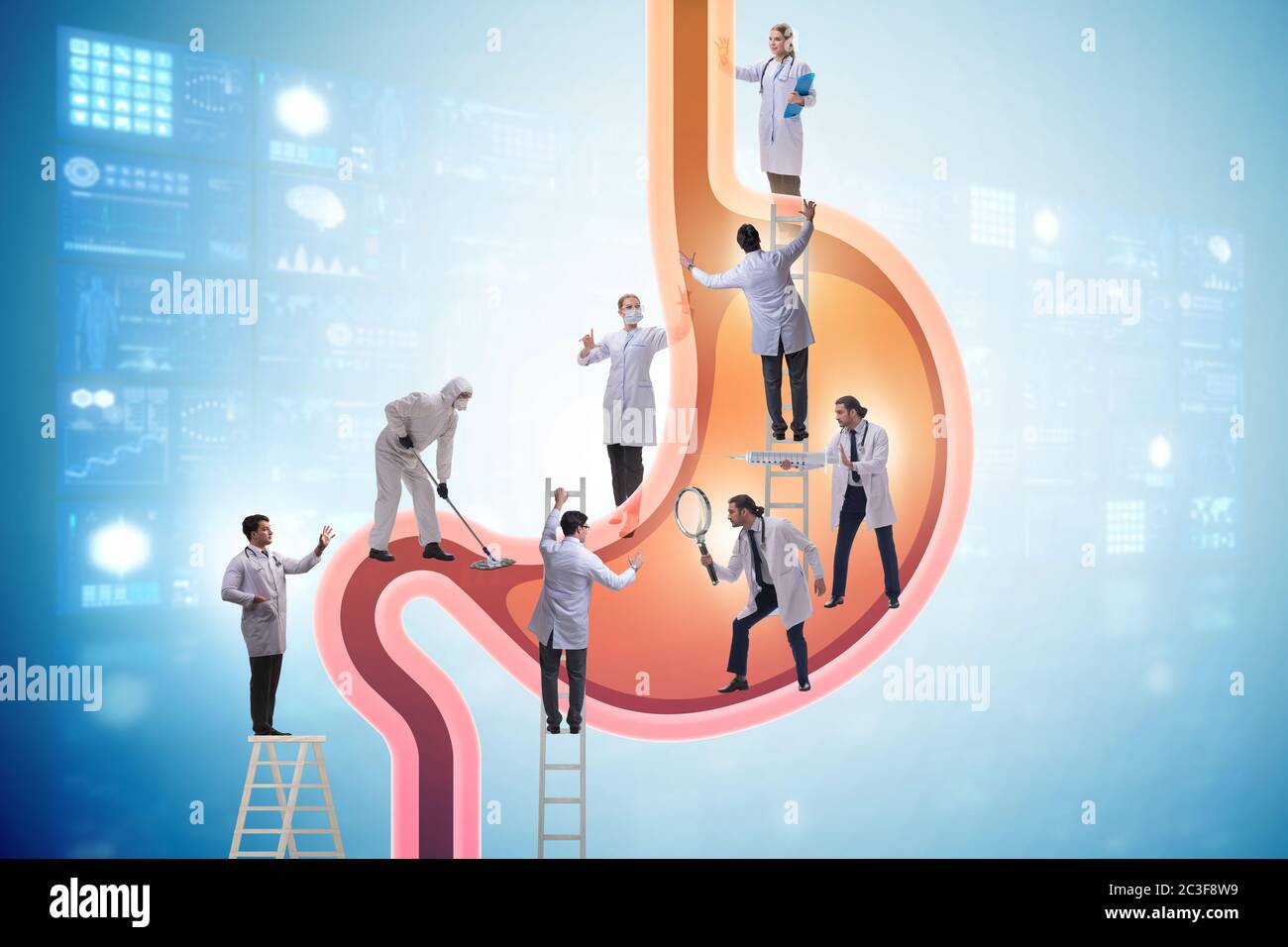 Doctors examining stomach in medical concept Stock Photo - Alamy