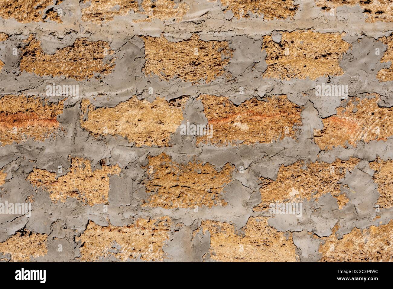 Wild stone shell rock wall texture. Uneven surface of shell rock wall ...