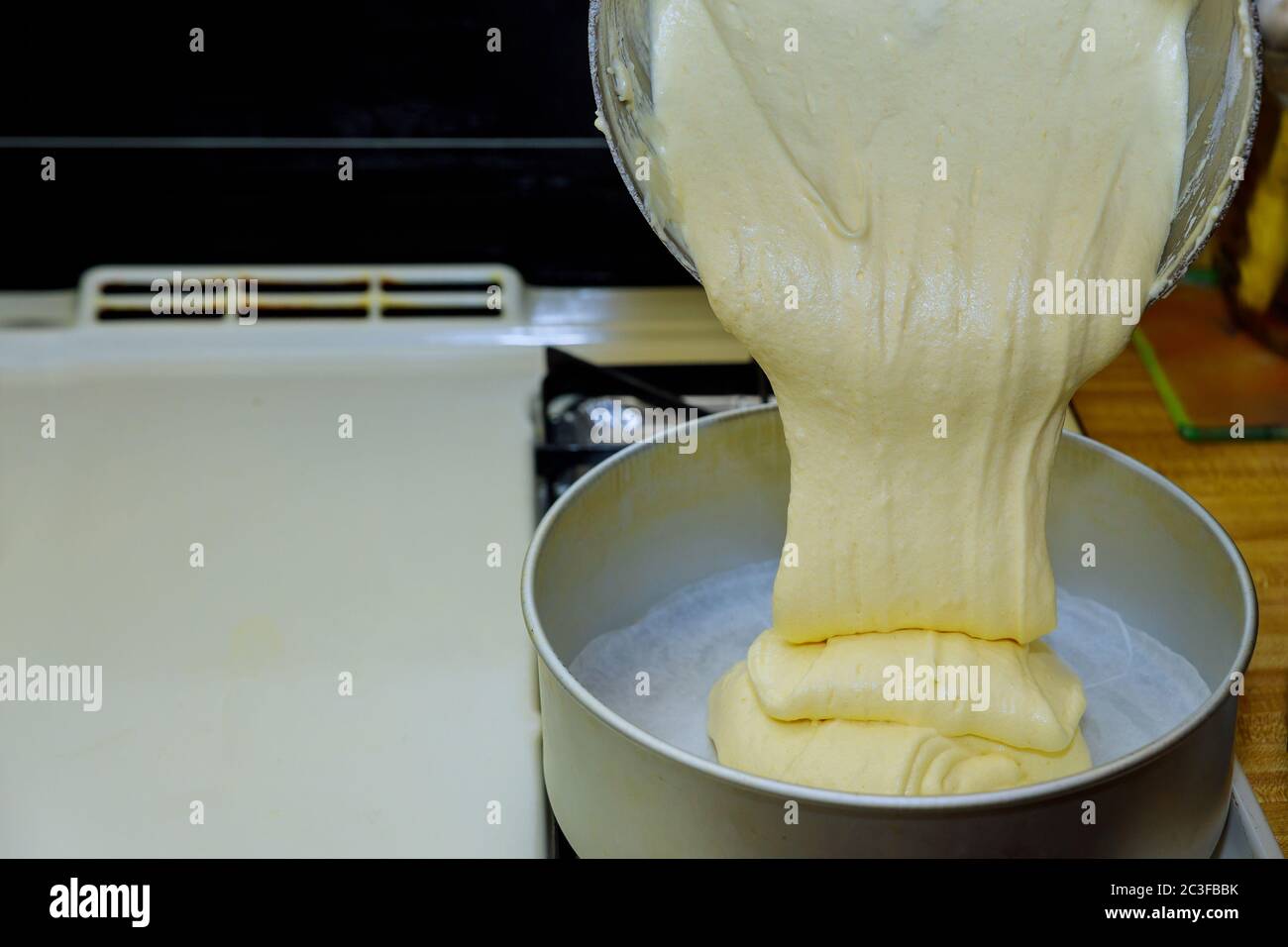 Pouring cake mix pan making hi-res stock photography and images - Alamy