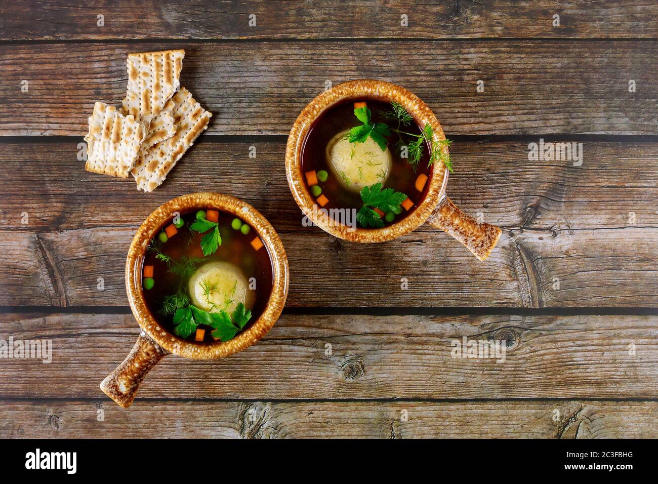 Traditional Jewish passover matzo ball soup, matzoh and matzo balls ...