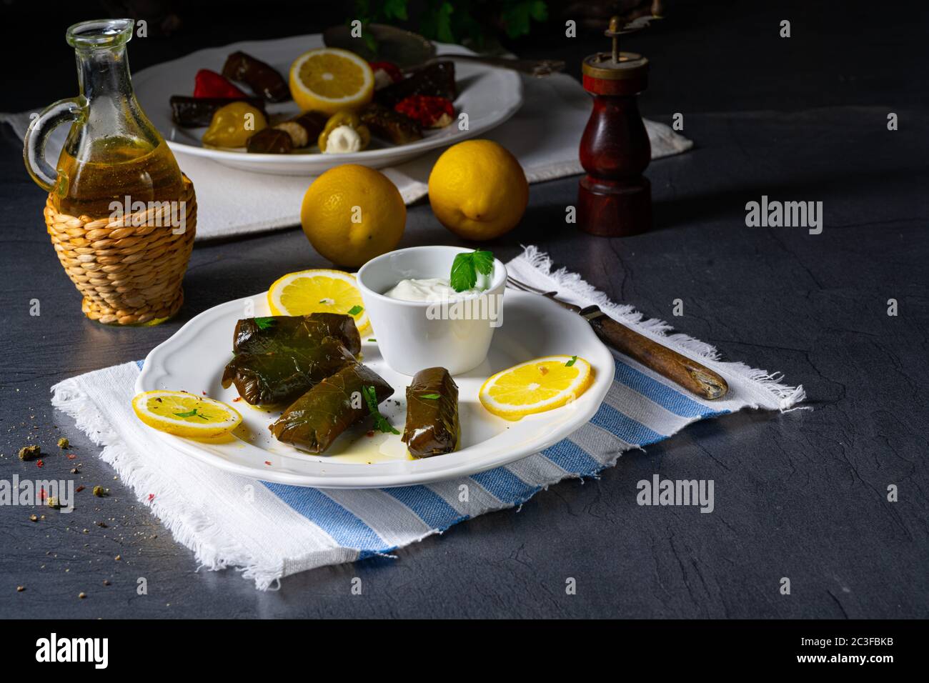 Dolmades - stuffed grape leaves the Greek way Stock Photo - Alamy