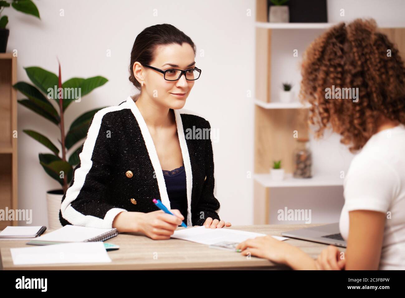 The woman gives a bribe to the envelope for a successful solution Stock ...