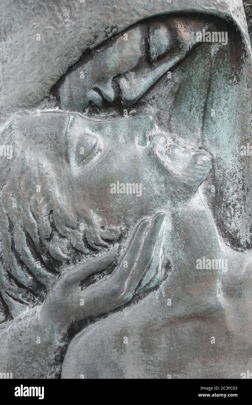Virgin and Jesus bas relief Stock Photo - Alamy