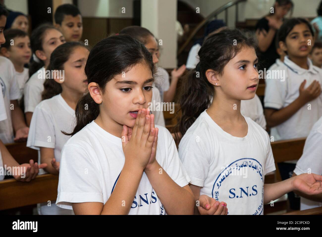 The Rev. Androwas Bahus leads an early morning liturgy at St. Peter and ...