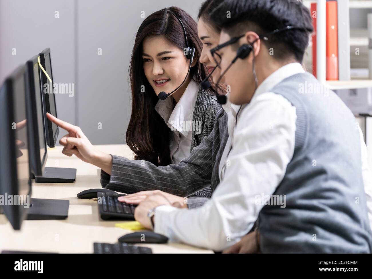 Call Center working 24 Hr Stock Photo - Alamy