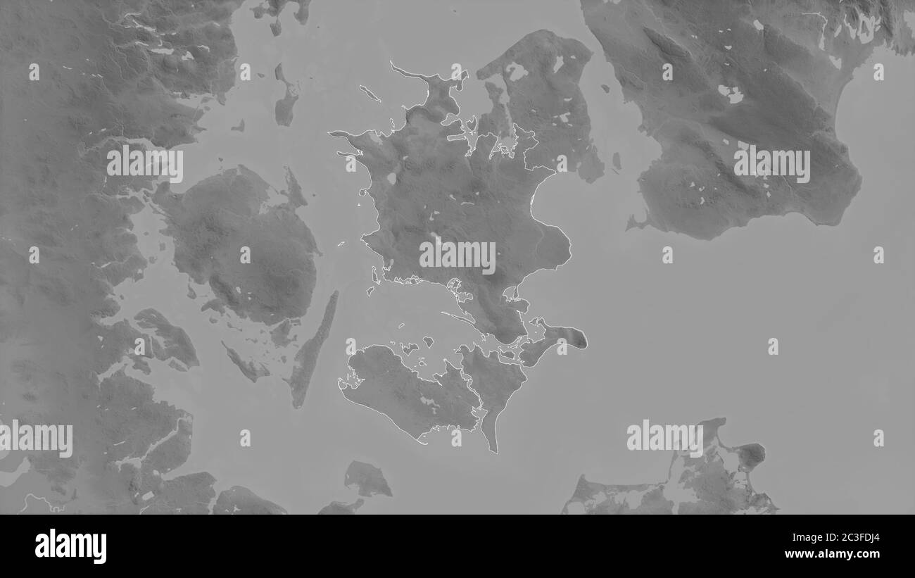 Sjælland, region of Denmark. Grayscaled map with lakes and rivers. Shape outlined against its ...