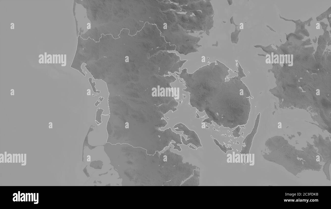 Syddanmark, region of Denmark. Grayscaled map with lakes and rivers. Shape outlined against its ...