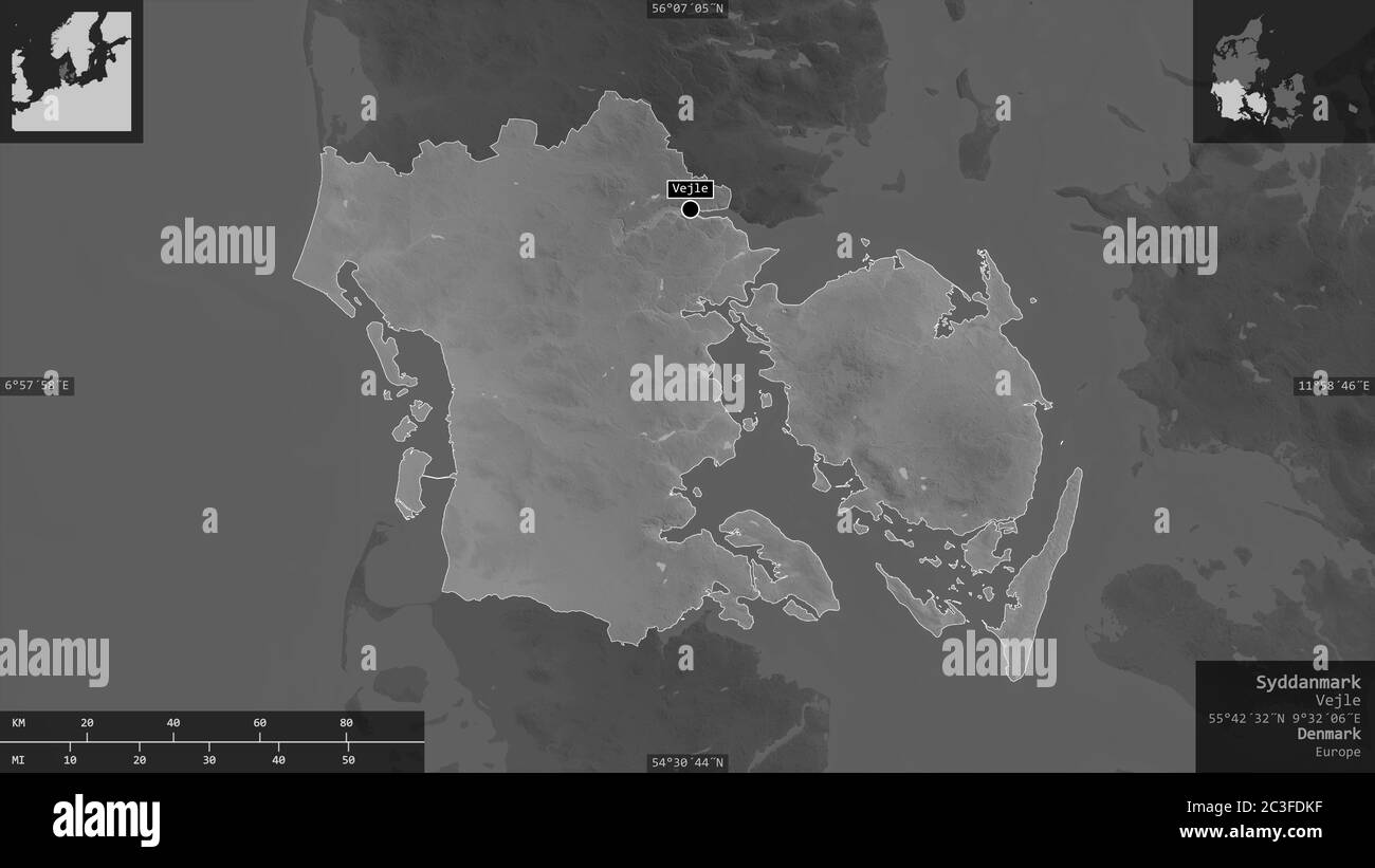 Syddanmark, region of Denmark. Grayscaled map with lakes and rivers. Shape presented against its ...