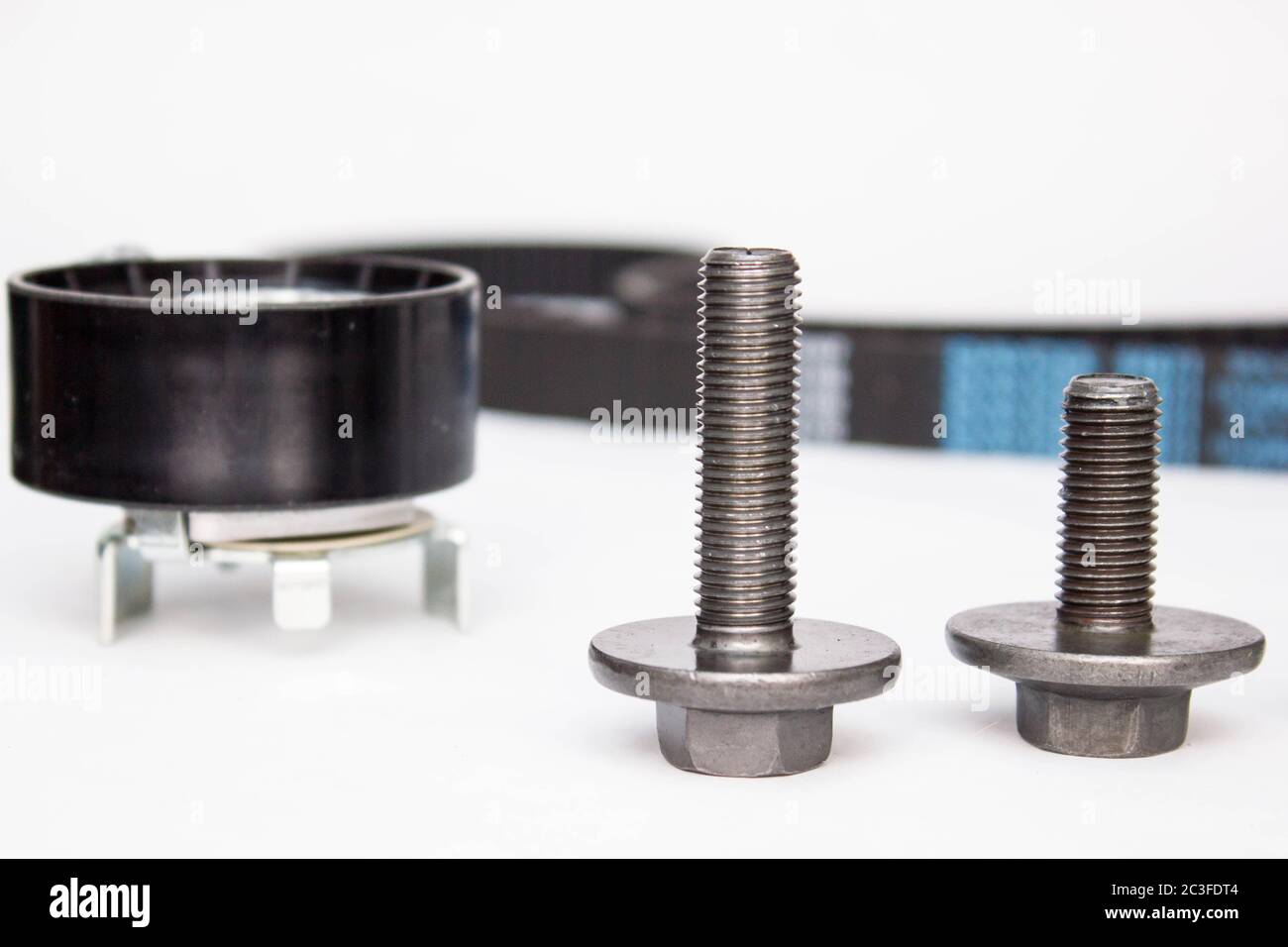 Repair kit: gear belt and bolts isolated on a white background. Car ...