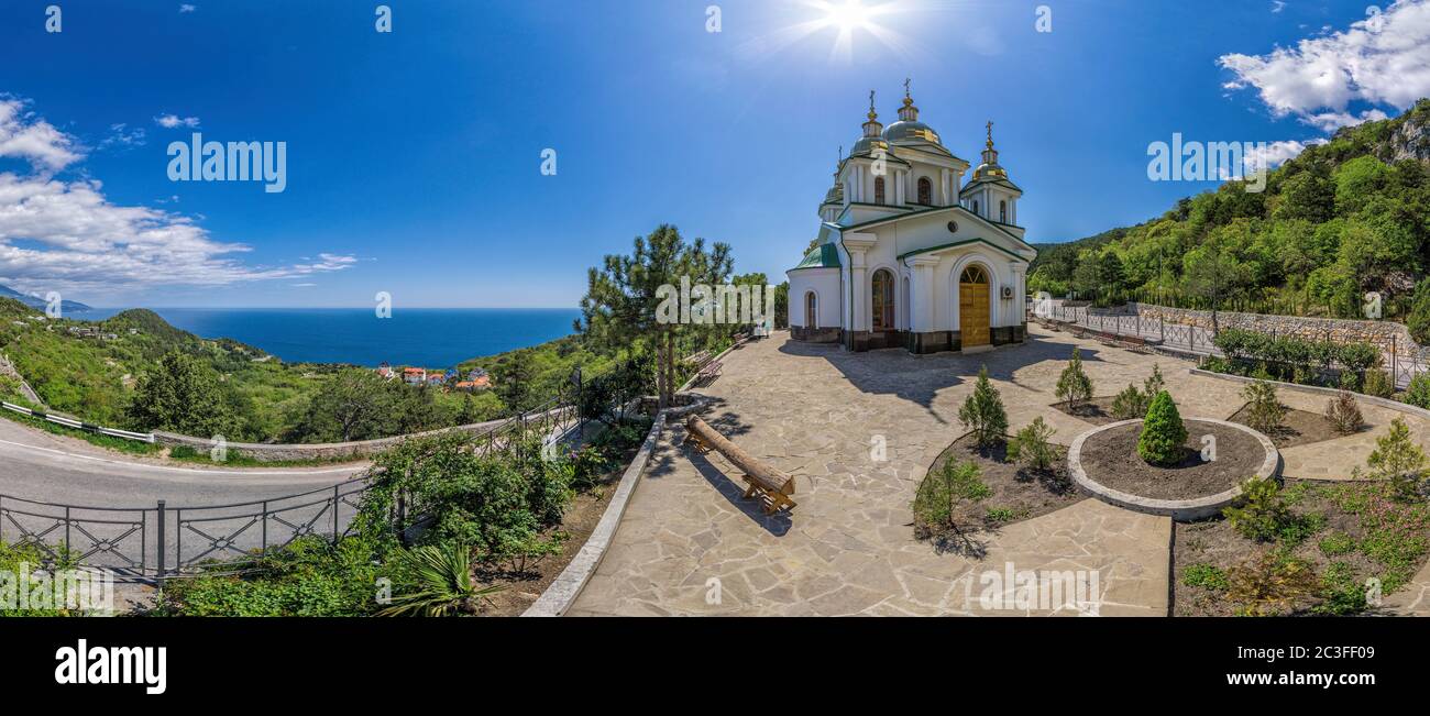 Christian church on a background of mountains. Temple of the Holy ...