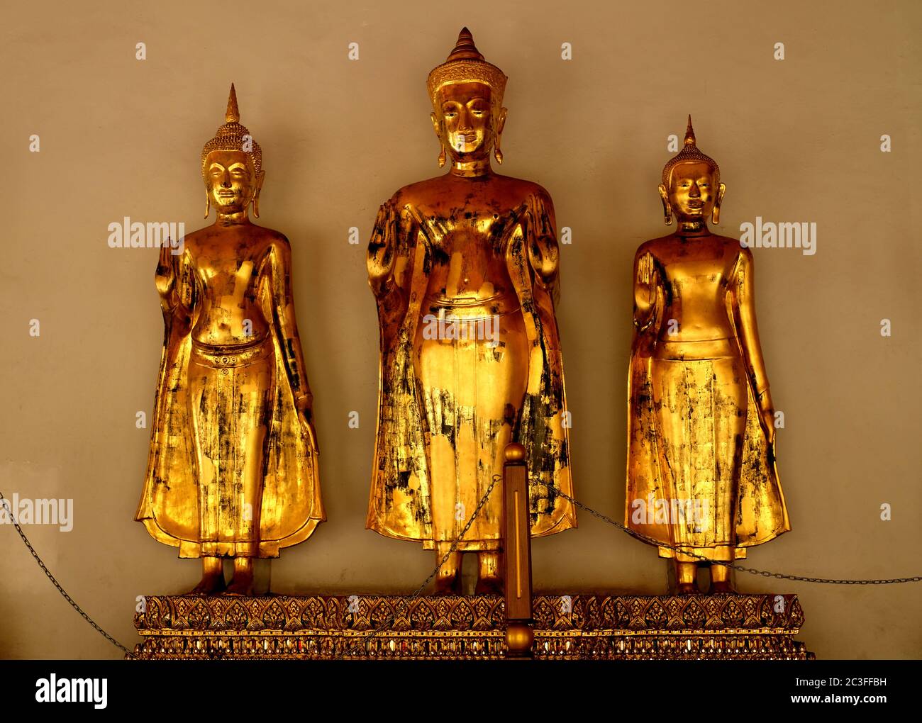 Three Standing Buddha Images Stock Photo - Alamy