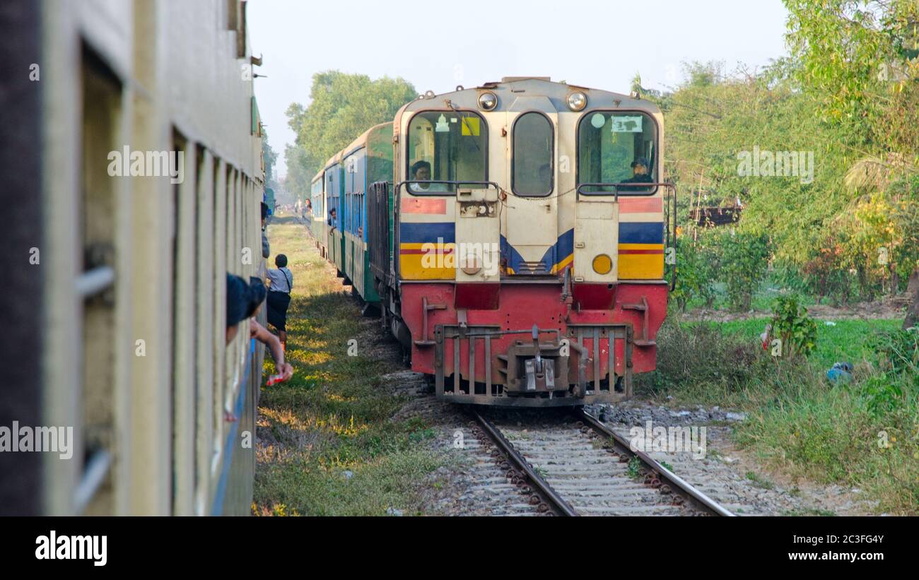 Burmese train rides through the countryside. Myanmar Stock Photo - Alamy