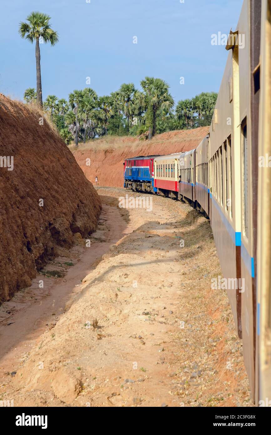 Burmese train rides through the countryside. Myanmar Stock Photo - Alamy