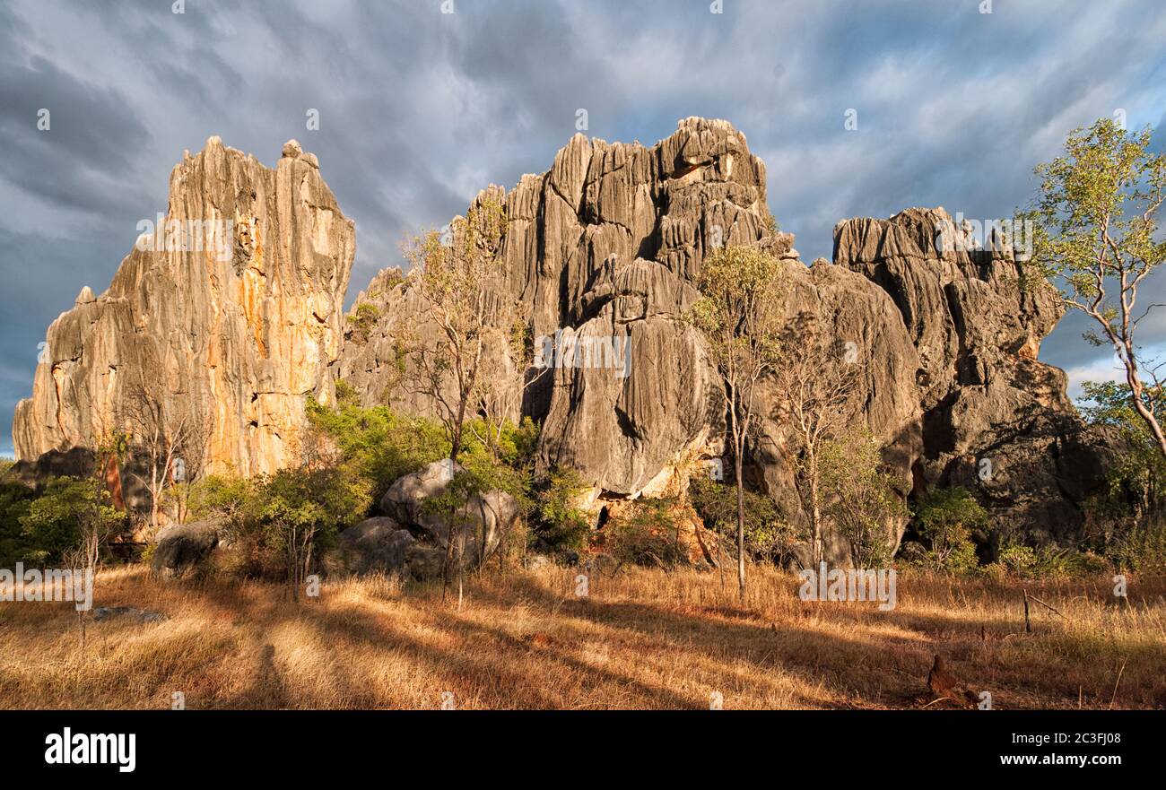 Long shadows preceding sunset approach the ramparts of the limestone ...