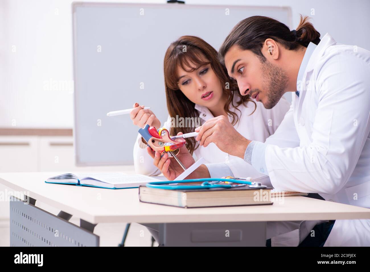 Science teacher demonstrating students hi-res stock photography and ...