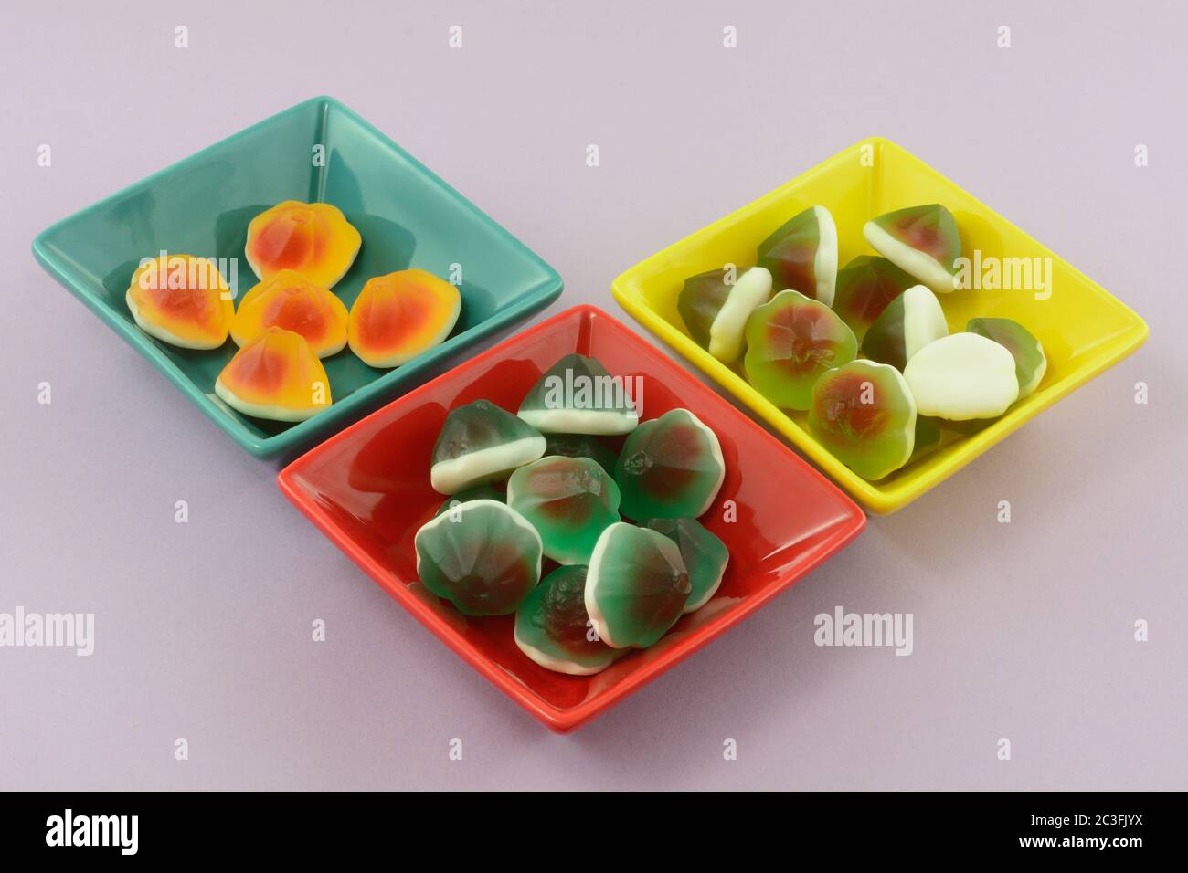 Sweet kiwi, lemon and blood orange gummy candies with sour apple ...