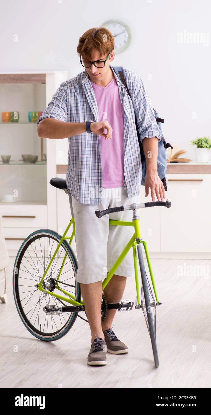 Student commuting to university using cycle Stock Photo - Alamy
