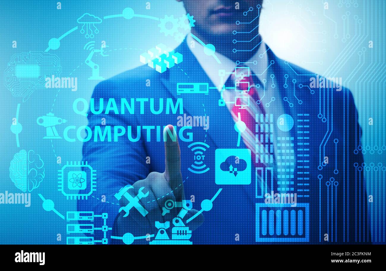 Businessman pressing virtual button in quantum computing concept Stock ...