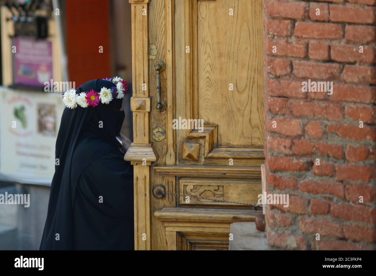 Muslim woman wearing burka entering Jumah Mosque, Tbilisi, Republic of ...