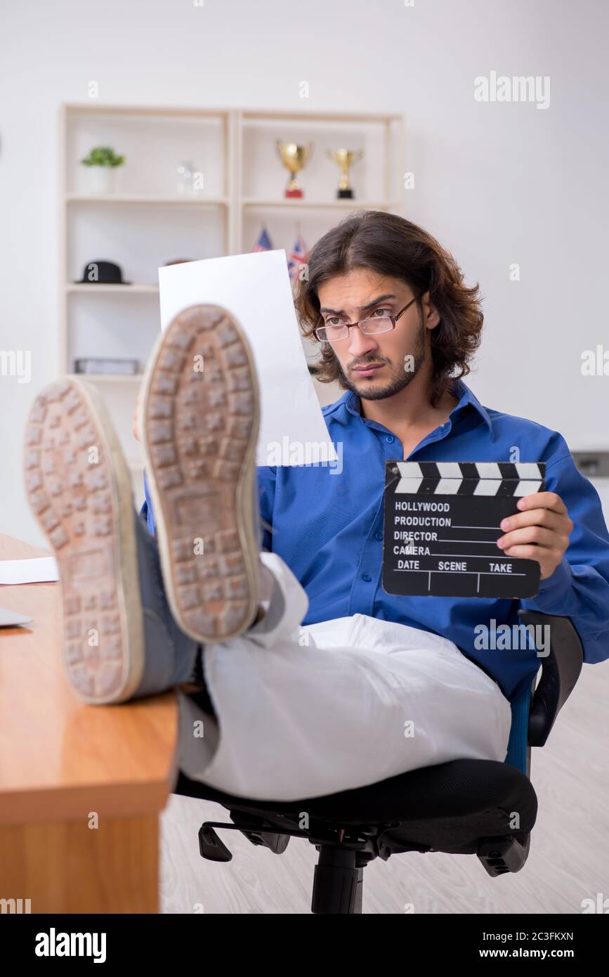 Movie director working in the studio Stock Photo - Alamy