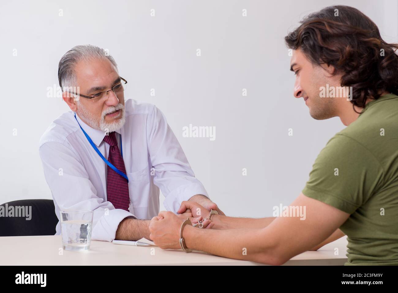 Jail Inmate Meeting With His Lawyer High Resolution Stock Photography ...