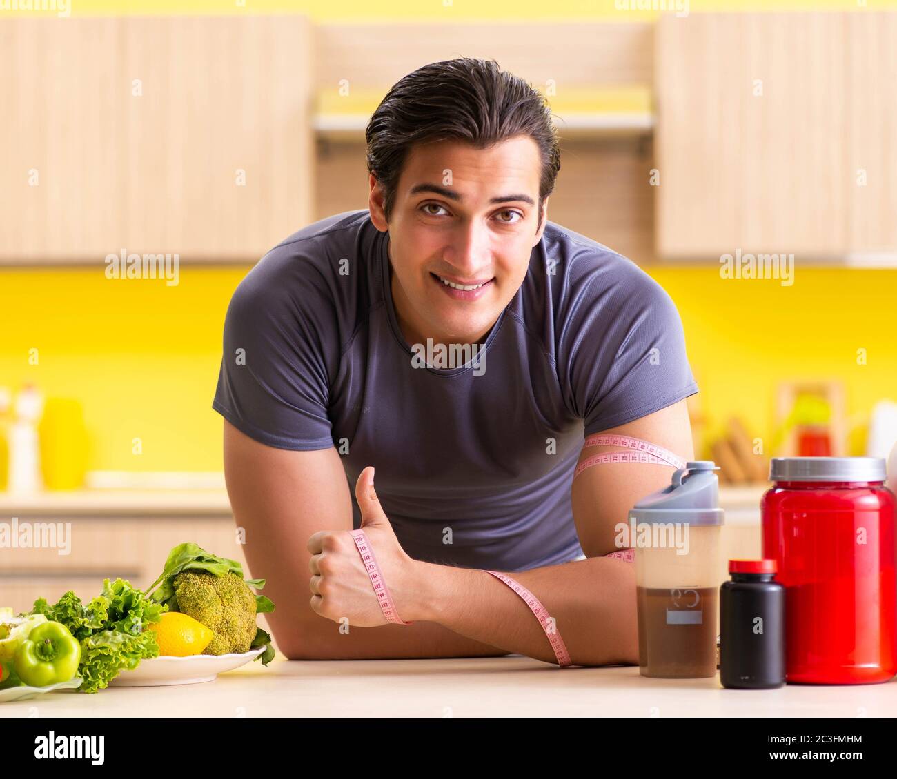 Muscle man eating protein hi-res stock photography and images - Alamy