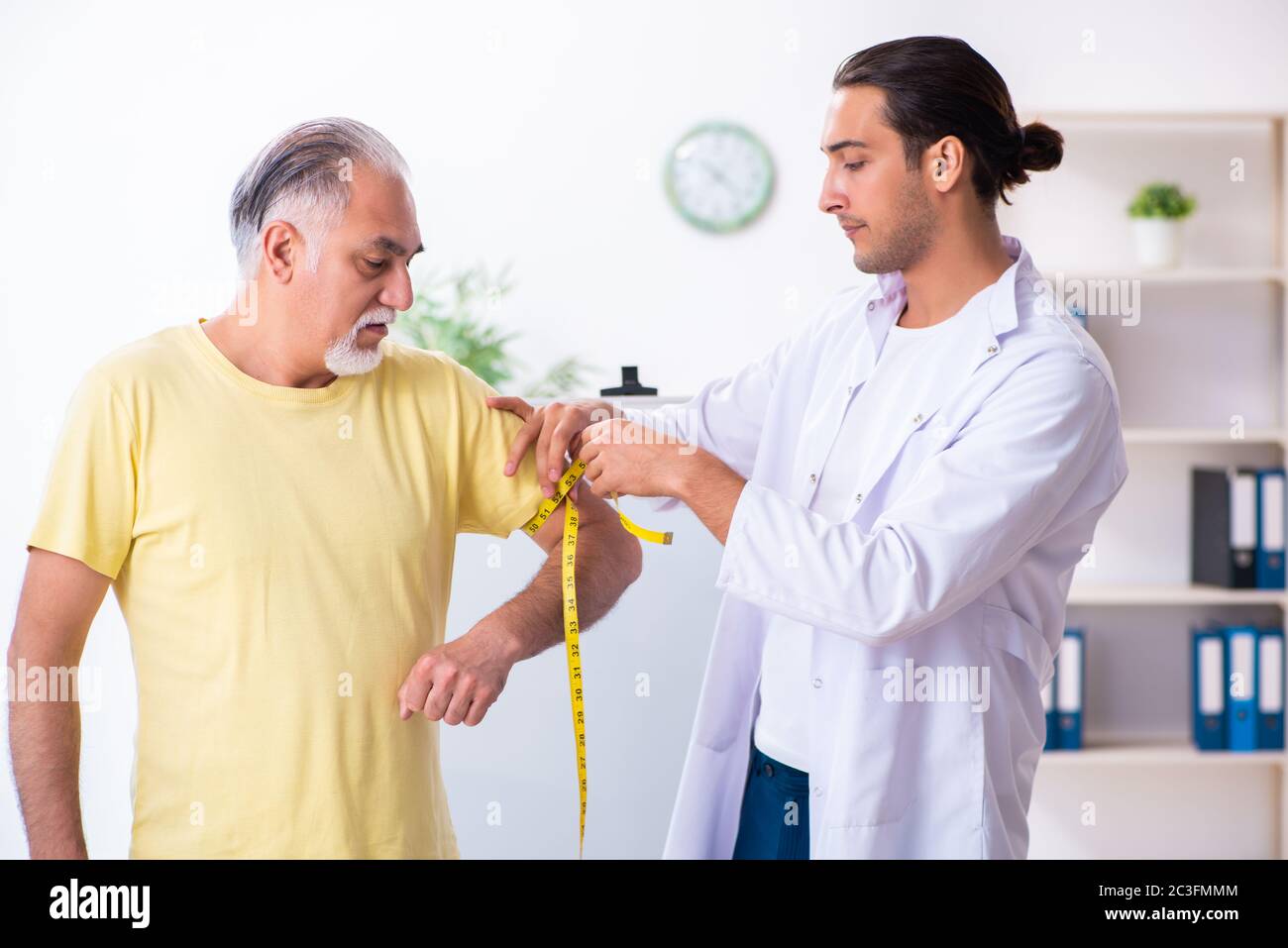 Doctor dietician giving advices to fat overweight patient Stock Photo ...
