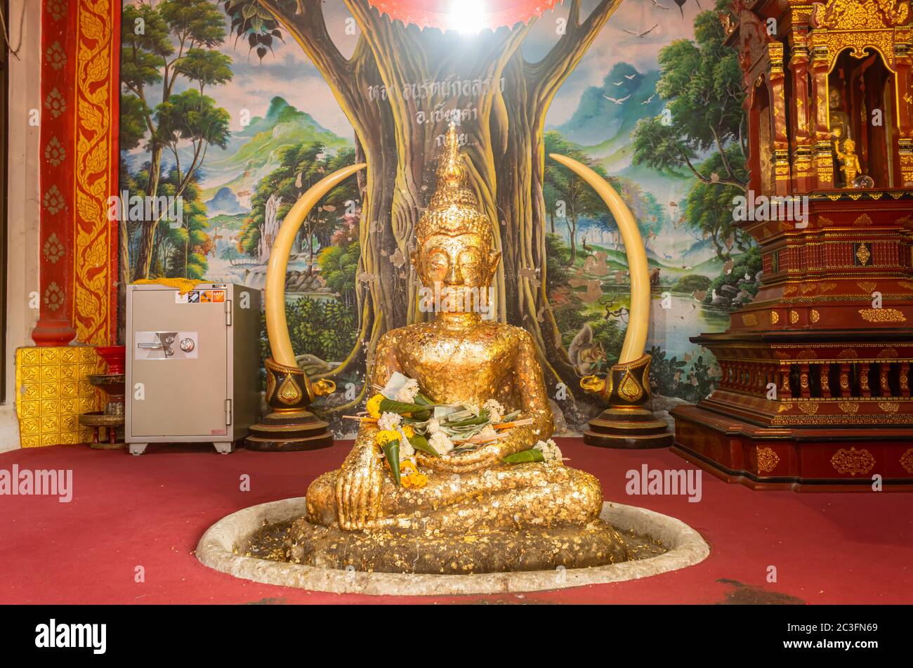 Phayao, Thailand - Dec 31, 2019: Gold Buddha Statue on Tree Painting ...