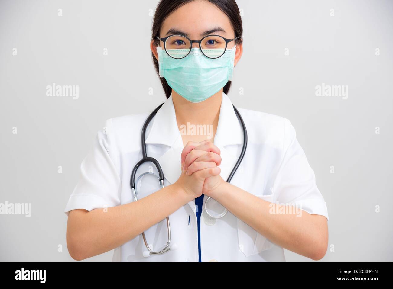 Woman doctor ask for cooperation Stock Photo - Alamy