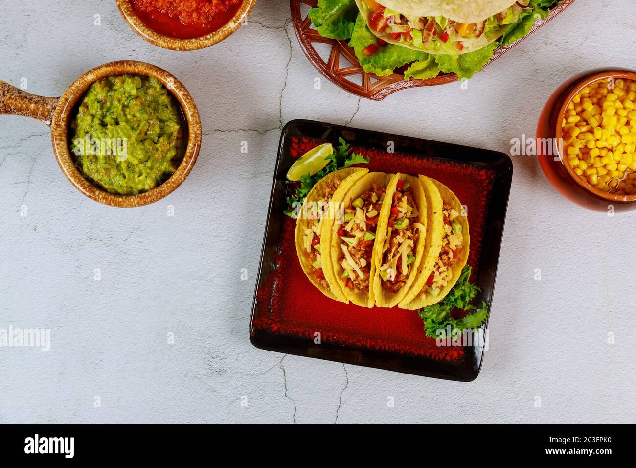 Stuffed taco shells with beef, salsa and guacamole, mexican dish tacos ...